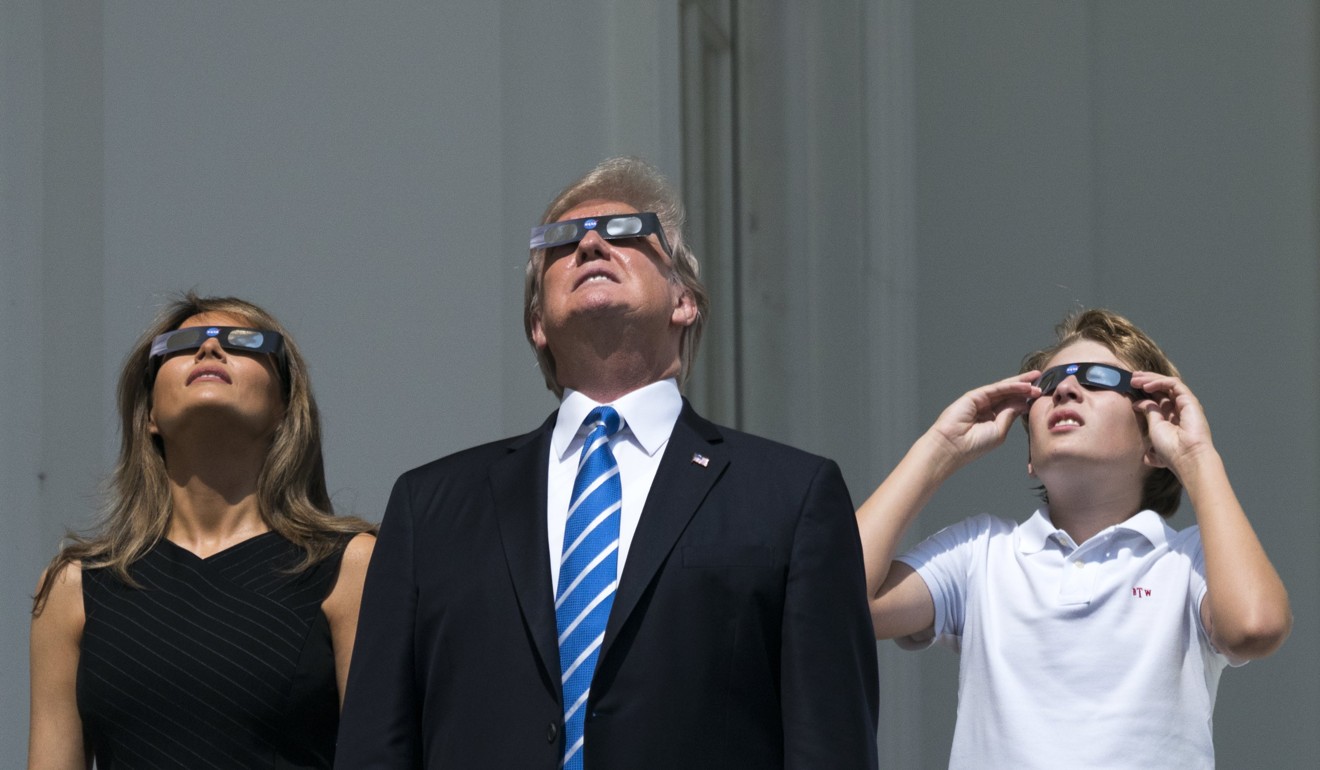 Donald Trump stares at eclipse without glasses. Don’t look, shouts a ...
