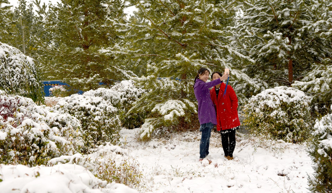 First autumn snows for northern China after temperatures plunge ...