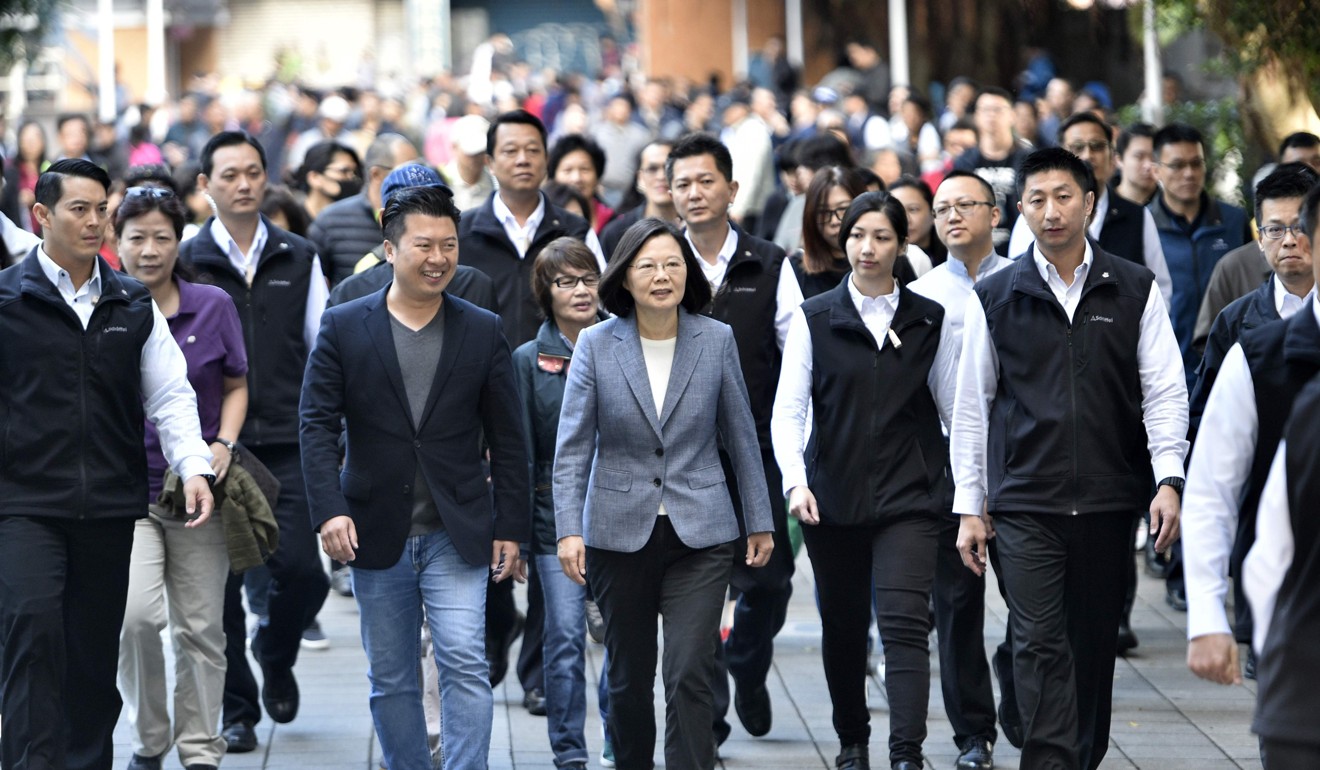 Taiwan set for high election turnout as voters queue to deliver their ...