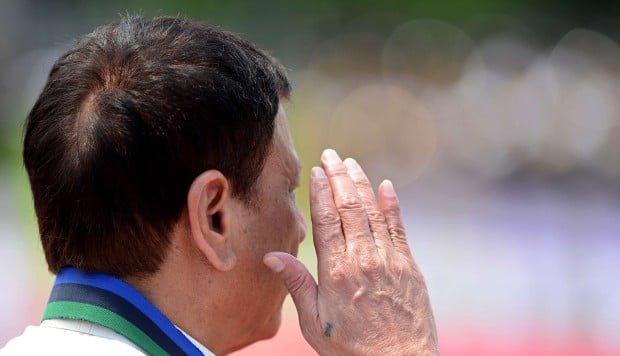 Revealed: the secret meaning behind the tiny tattoo on Philippine ...