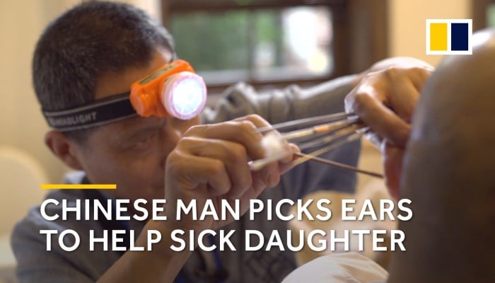 Chinese father takes daughter’s ear picker job to pay for her cancer ...