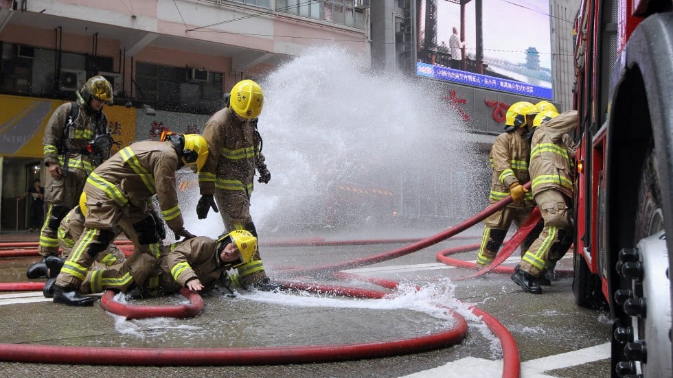 Search under way for cause of third-alarm fire in Hong Kong residential ...