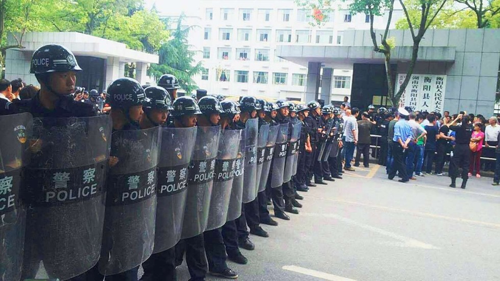 Riot police deployed as teachers in central China stage protest over ...